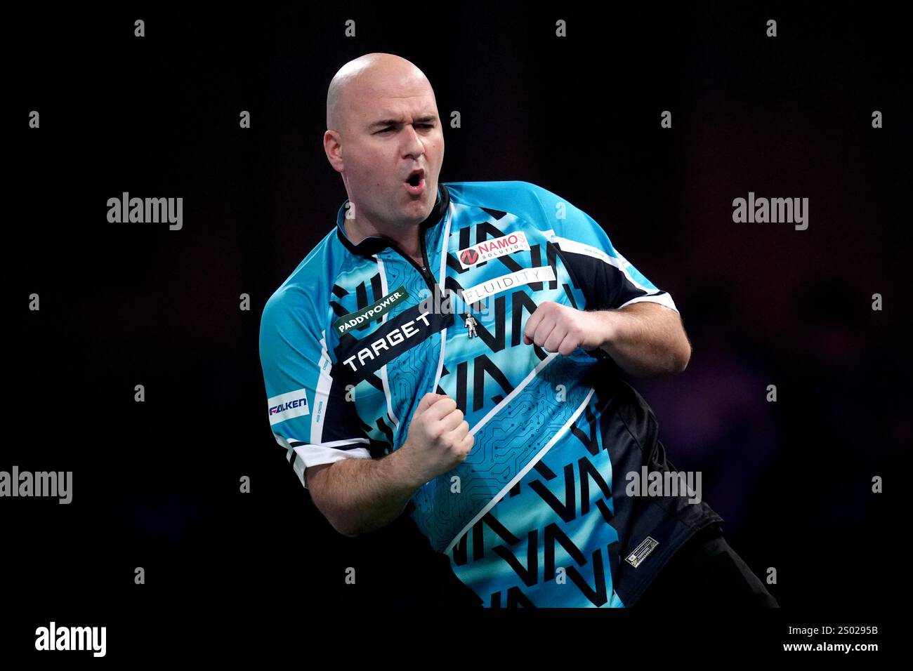 Rob Cross reacts during his match against Scott Williams during day ...