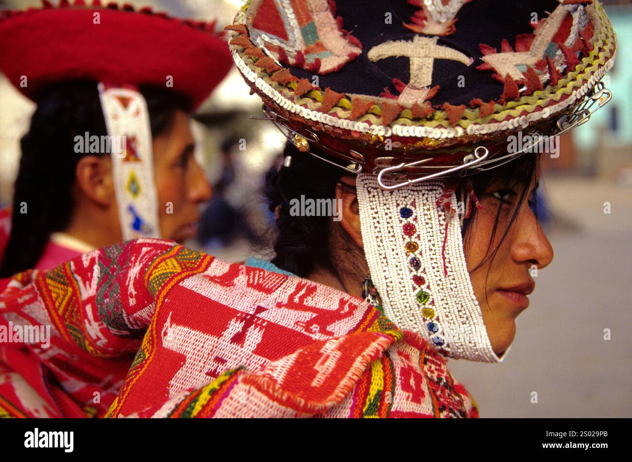 Women in traditional Andean attire in Ollantaytambo, Peru, featuring ...