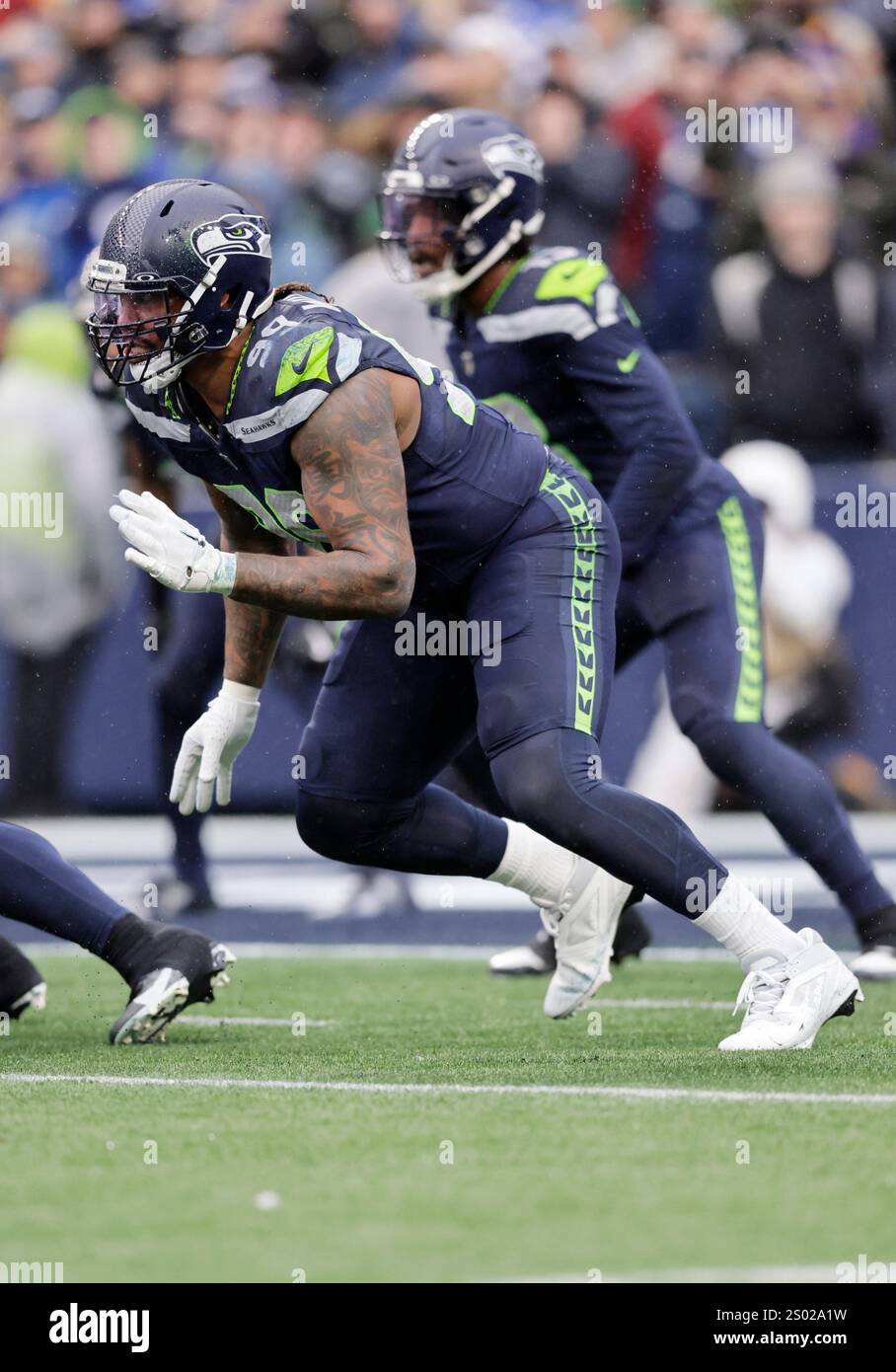 Seattle Seahawks defensive end Leonard Williams (99) moves out of his ...