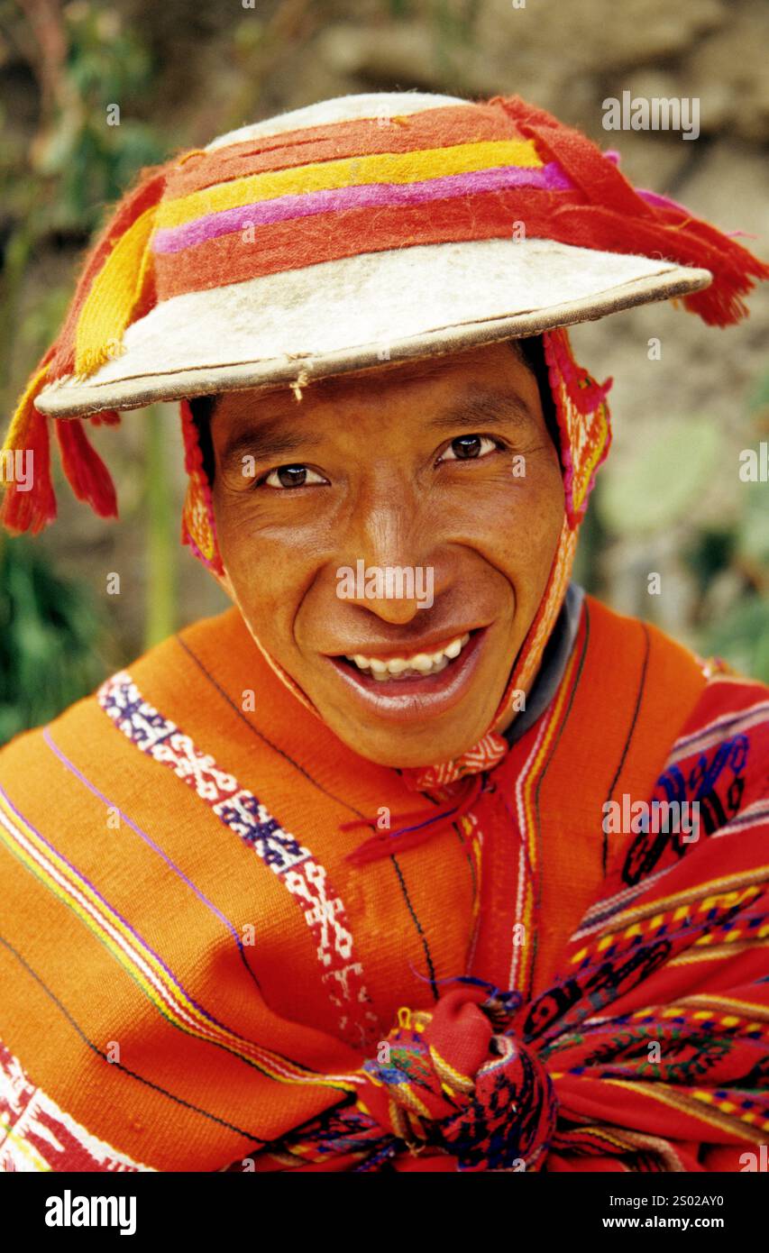 Man in traditional Andean attire in Ollantaytambo, Peru, wearing ...