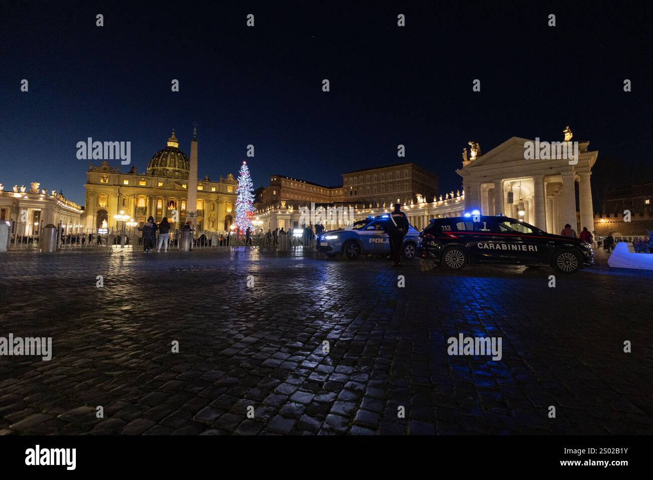 Rome, Italy. 23rd Dec, 2024. Police cars in St. Peter's Square in Rome ...