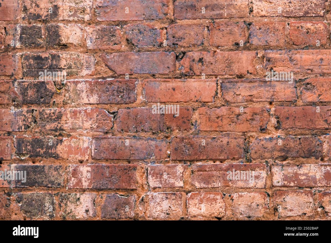 Antique brick wall with remnants of painted design Stock Photo - Alamy