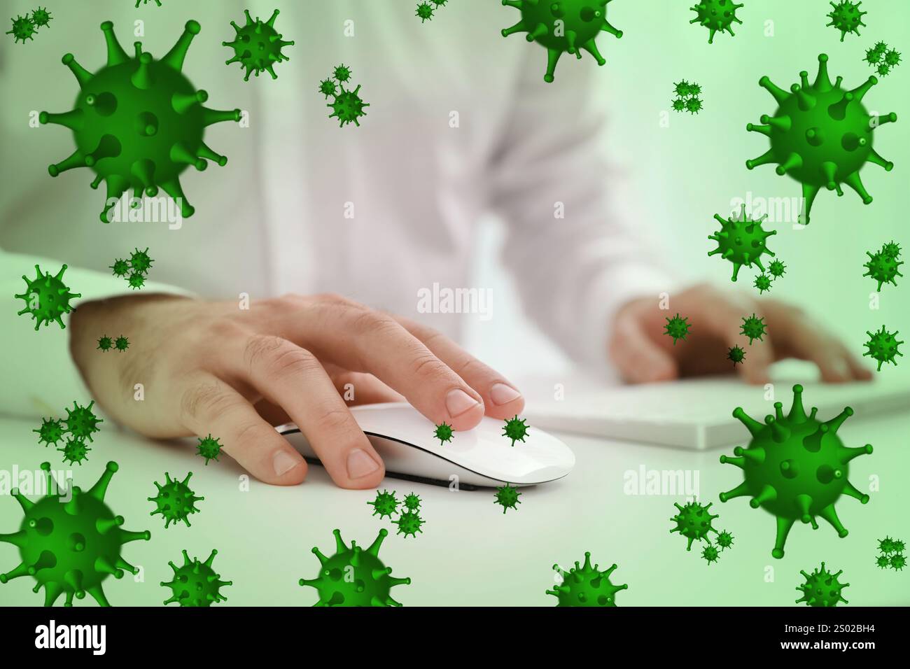 Man using computer mouse at table, closeup. Pathogens transmission ...