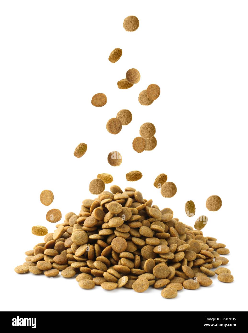 Dry pet food falling onto heap on white background Stock Photo - Alamy