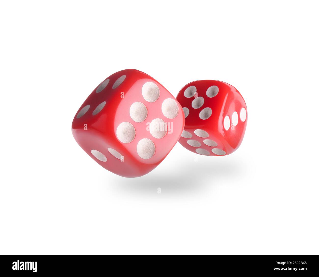 Two red dice in air on white background Stock Photo - Alamy