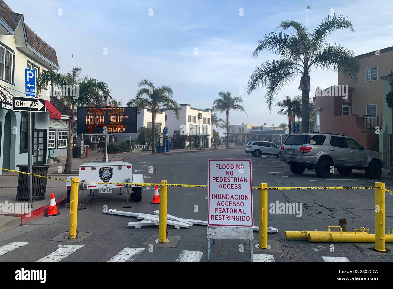 A street is closed due to high surf conditions near Capitola Beach ...