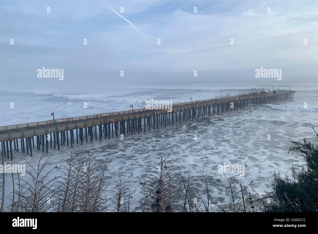 High surf rolls into the Capitola Wharf Monday, Dec. 23, 2024, in ...