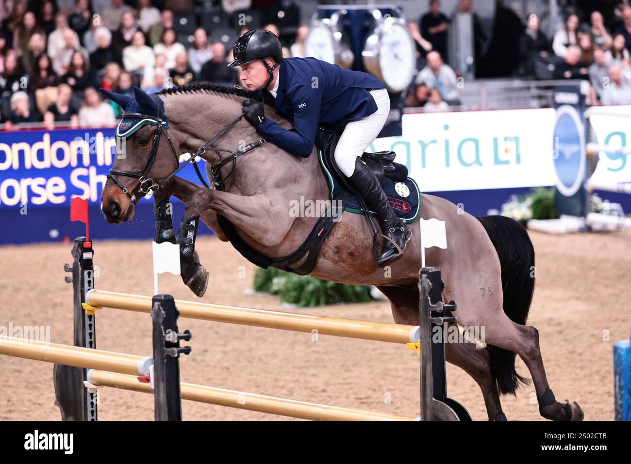 Mario Stevens of Germany with Starissa FRH during the Longines FEI ...