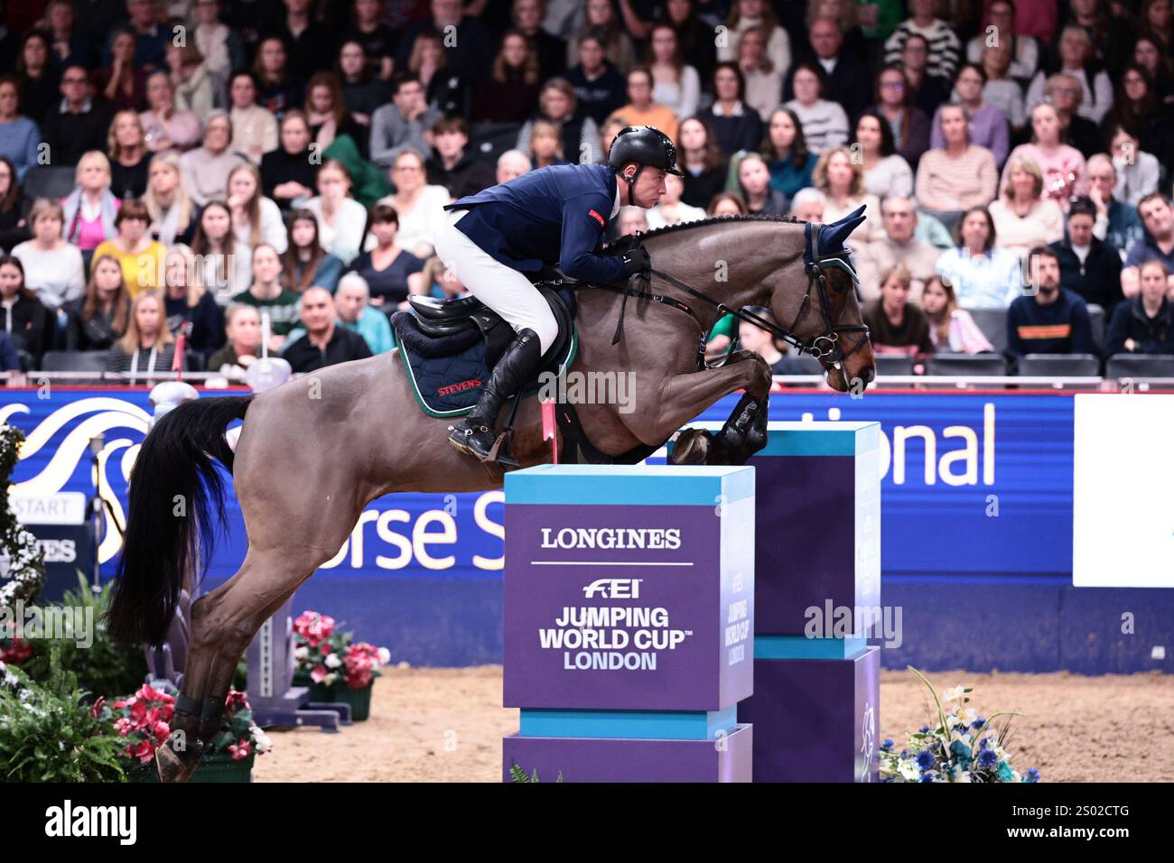 Mario Stevens of Germany with Starissa FRH during the Longines FEI ...