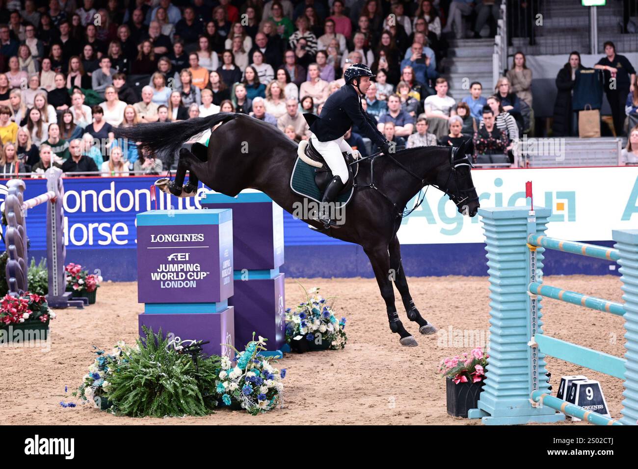 Robert Whitaker of United Kingdom with Vermento during the Longines FEI ...