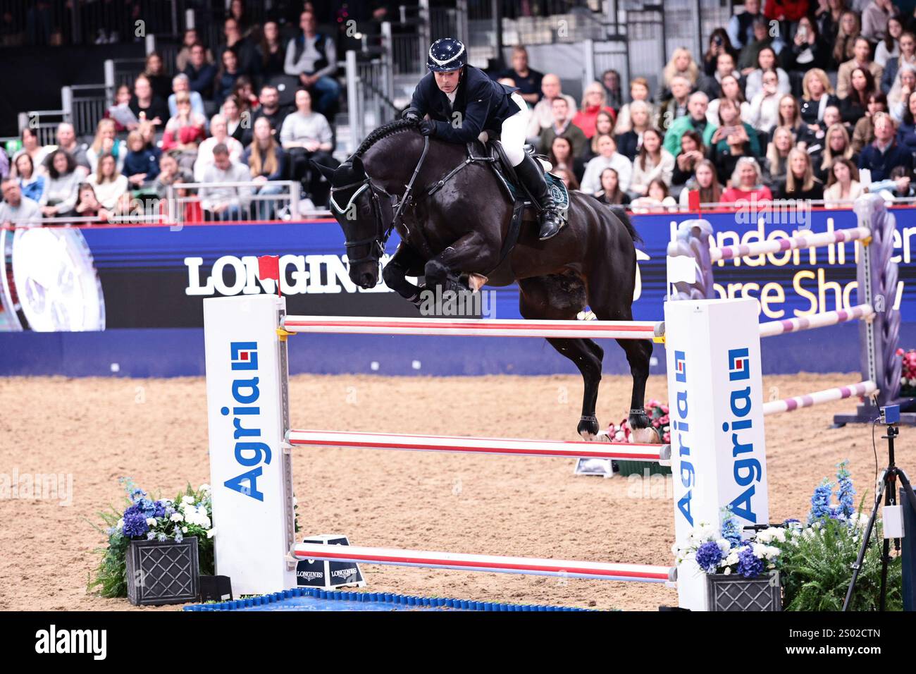Robert Whitaker of United Kingdom with Vermento during the Longines FEI ...