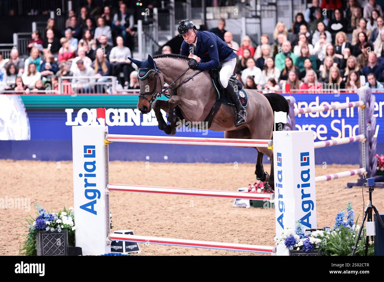 Mario Stevens of Germany with Starissa FRH during the Longines FEI ...