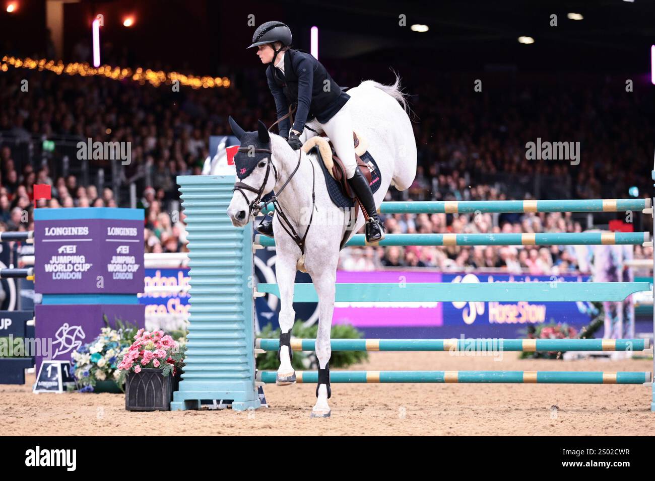 Sophie Hinners of Germany with Iron Dames my Prins during jump-off of ...