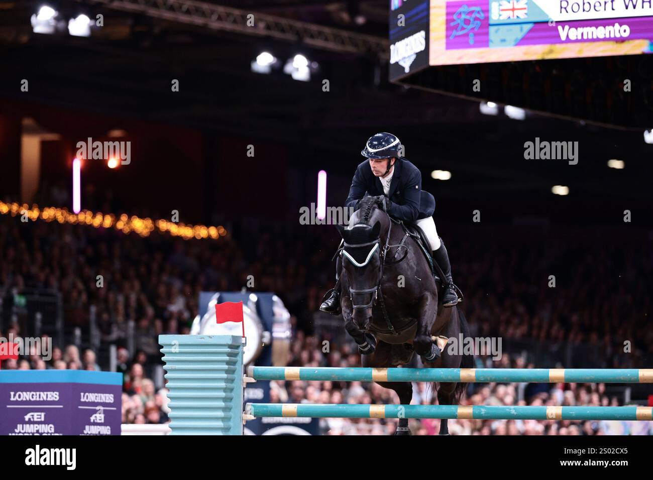 Robert Whitaker of United Kingdom with Vermento during jump-off of the ...