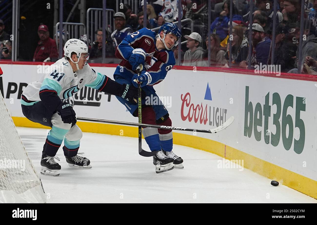 Seattle Kraken defenseman Ryker Evans (41) and Colorado Avalanche left ...