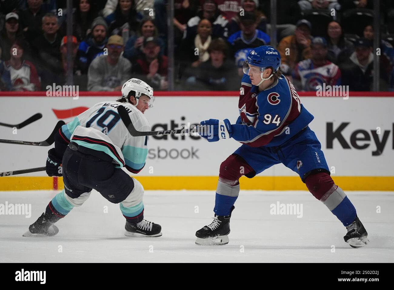 Colorado Avalanche left wing Joel Kiviranta (94) hits the pouck past ...
