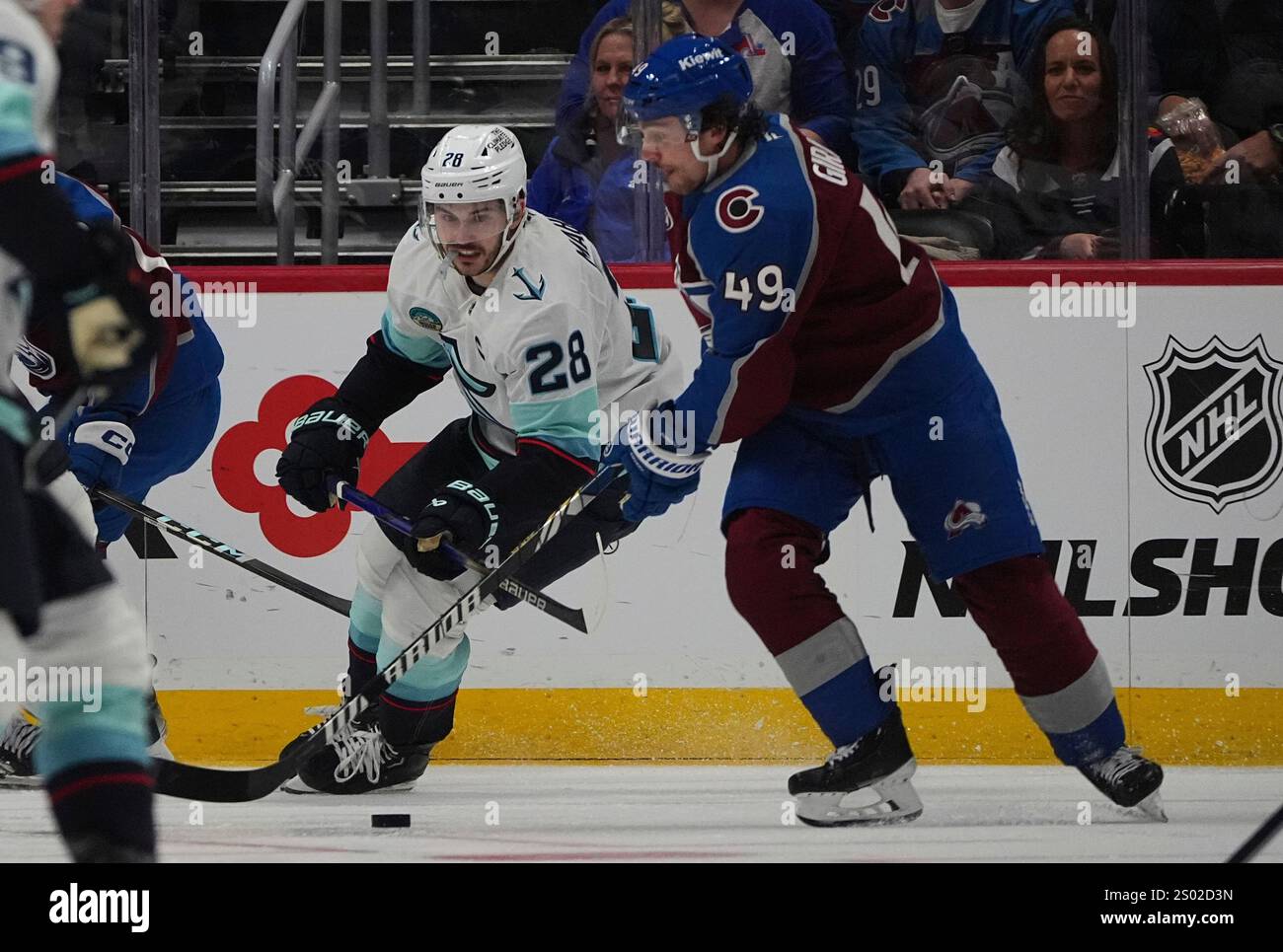 Seattle Kraken defenseman Joshua Mahura (28) and Colorado Avalanche ...