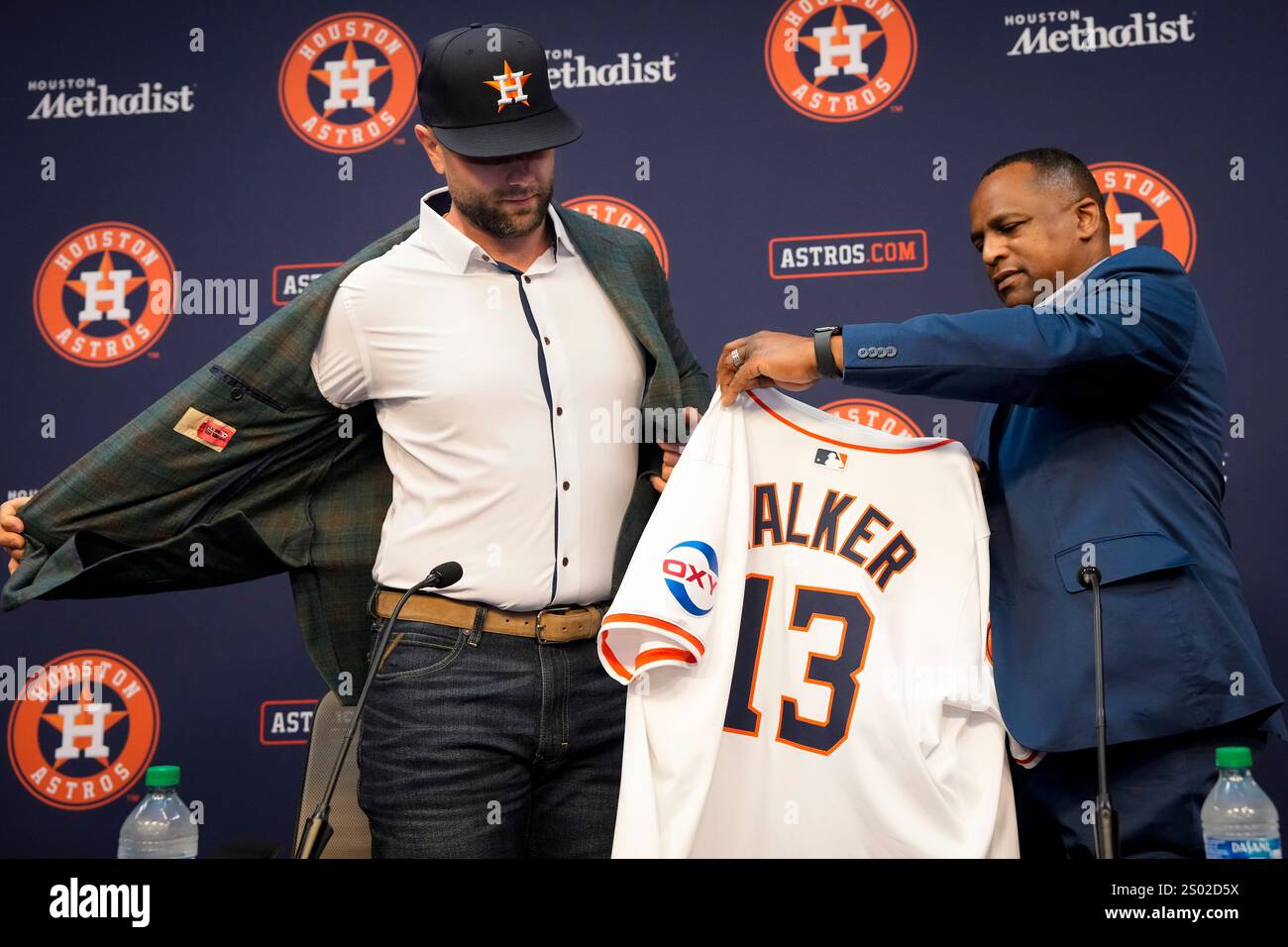 Houston Astros General Manager Dana Brown, right, presents new player ...