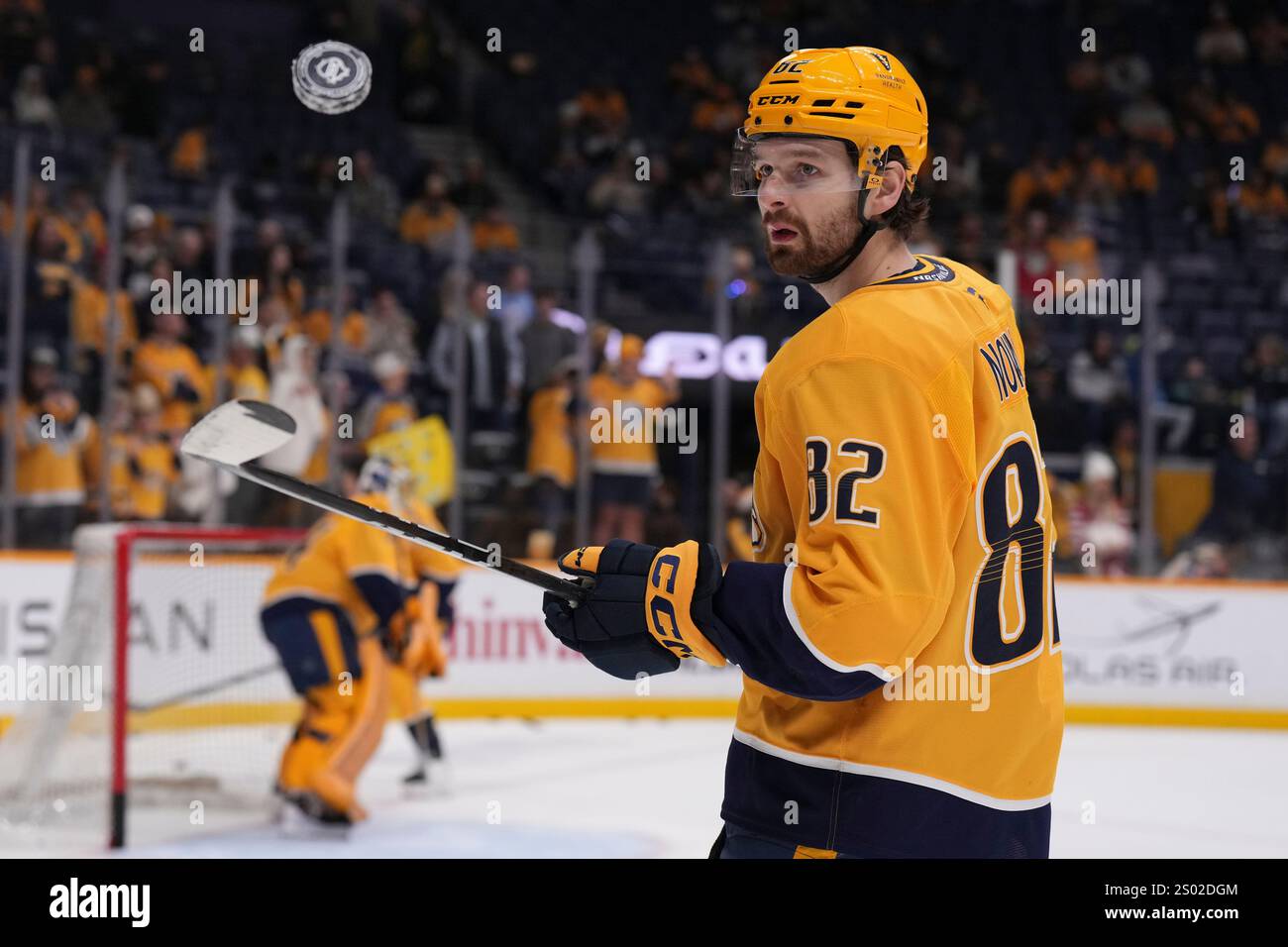 Nashville Predators center Tommy Novak (82) warms up for the team's NHL ...