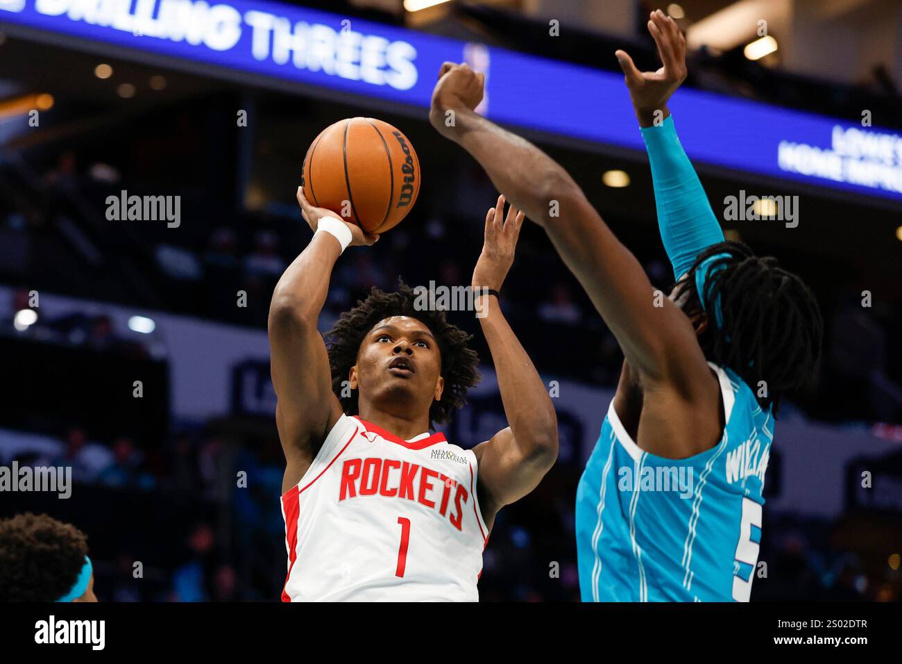 Houston Rockets forward Amen Thompson (1) shoots against Charlotte ...