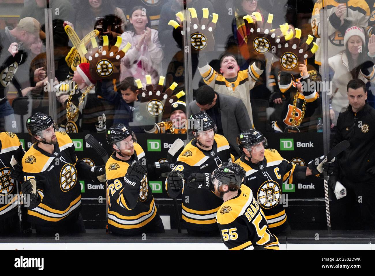 Boston Bruins right wing Justin Brazeau (55) is congratulated by ...