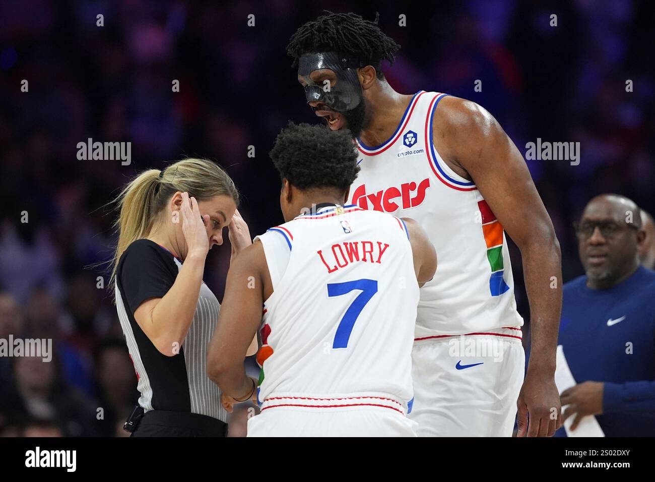 Philadelphia 76ers' Joel Embiid, right, argues with referee Jenna ...