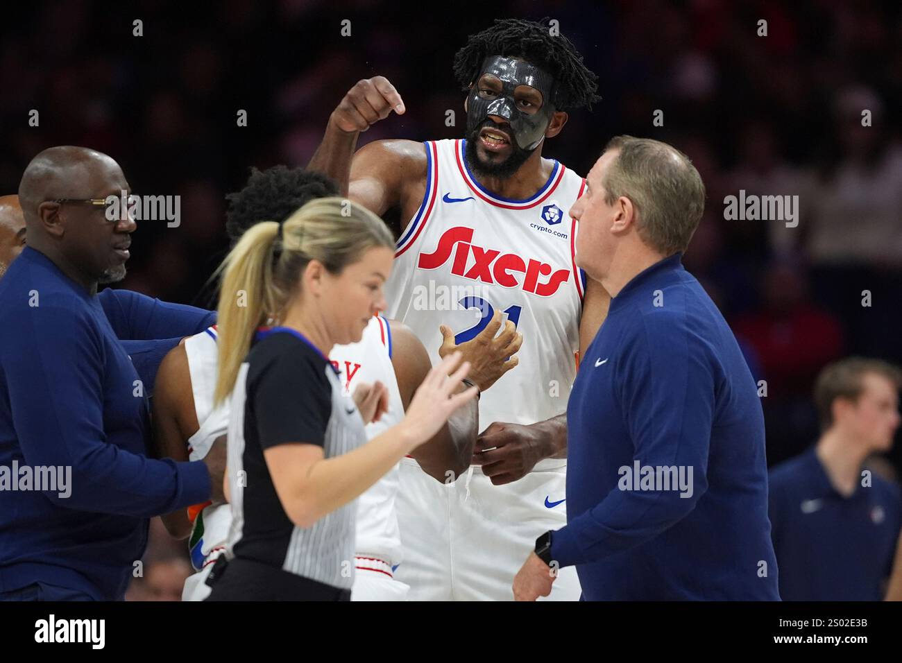 Philadelphia 76ers' Joel Embiid, right, argues with referee Jenna ...