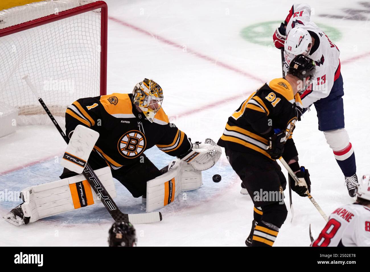 Boston Bruins goaltender Jeremy Swayman (1) makes a save on a shot by ...