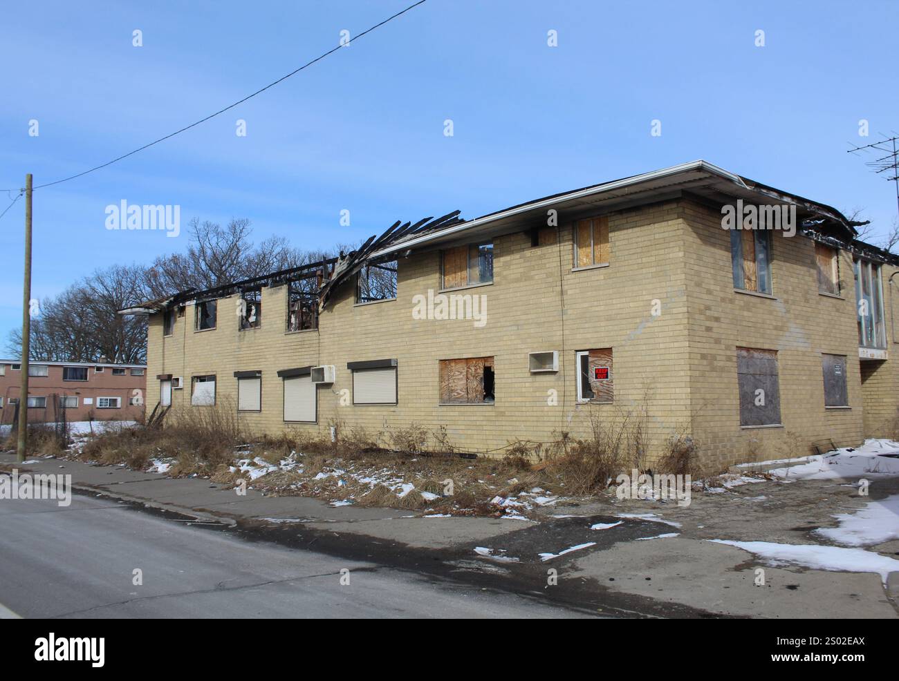 Abandoned yellow brick apartment building in the Plymouth-Hubbell ...
