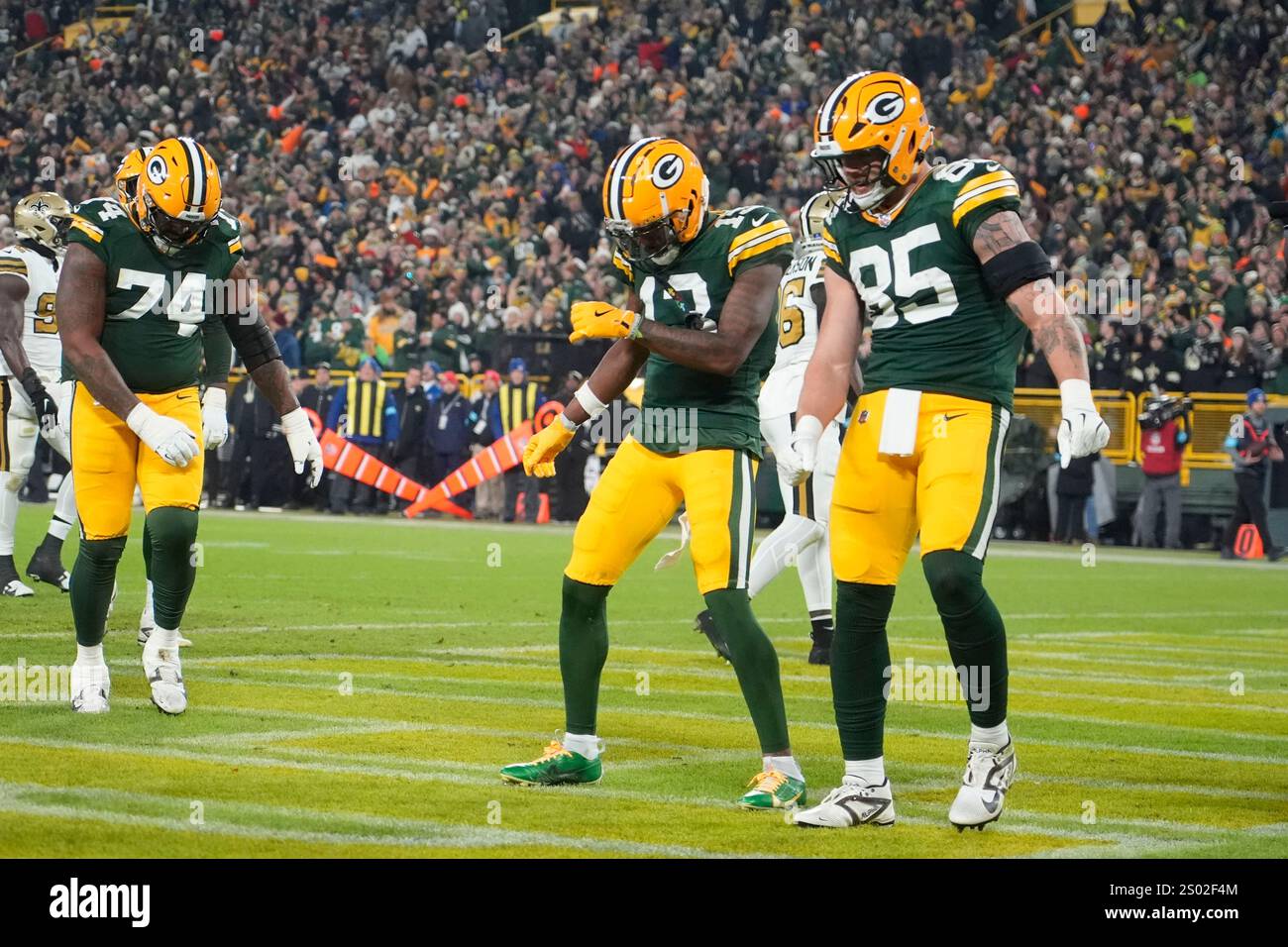Green Bay Packers wide receiver Dontayvion Wicks (13) celebrates his ...