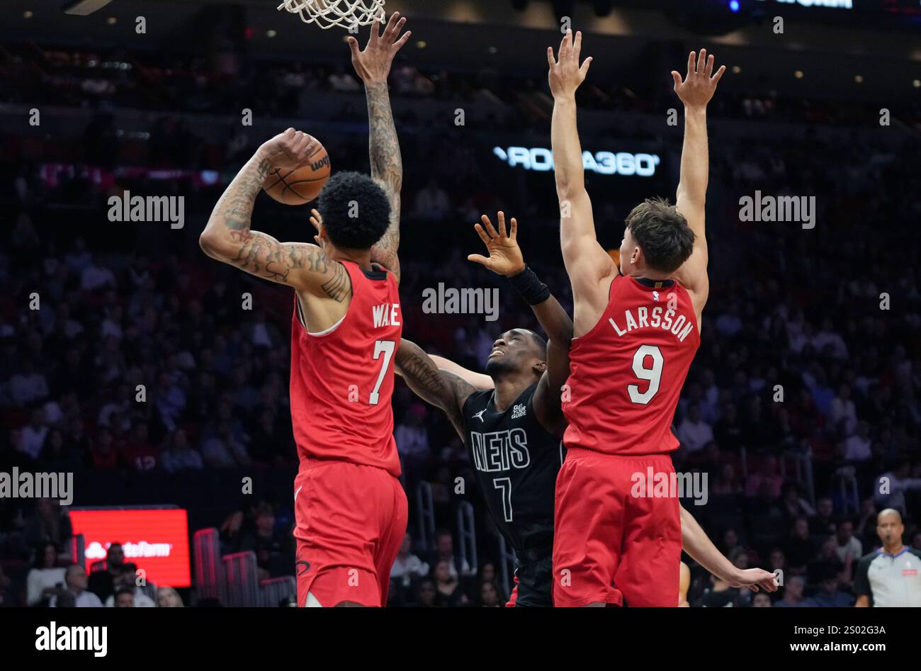 Brooklyn Nets guard Shake Milton, center, loses control of the ball as ...
