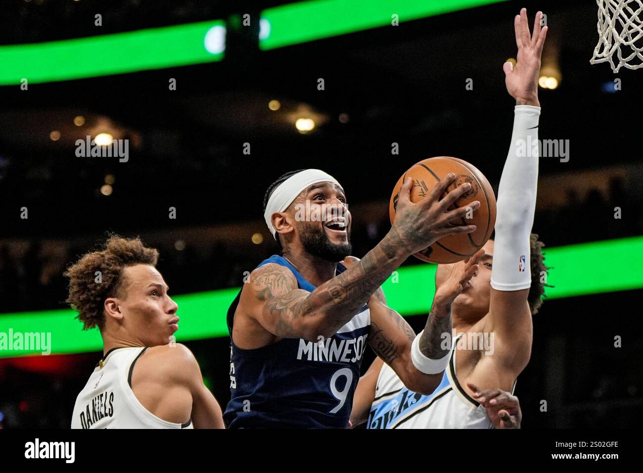 Minnesota Timberwolves guard Nickeil Alexander-Walker (9) drives ...