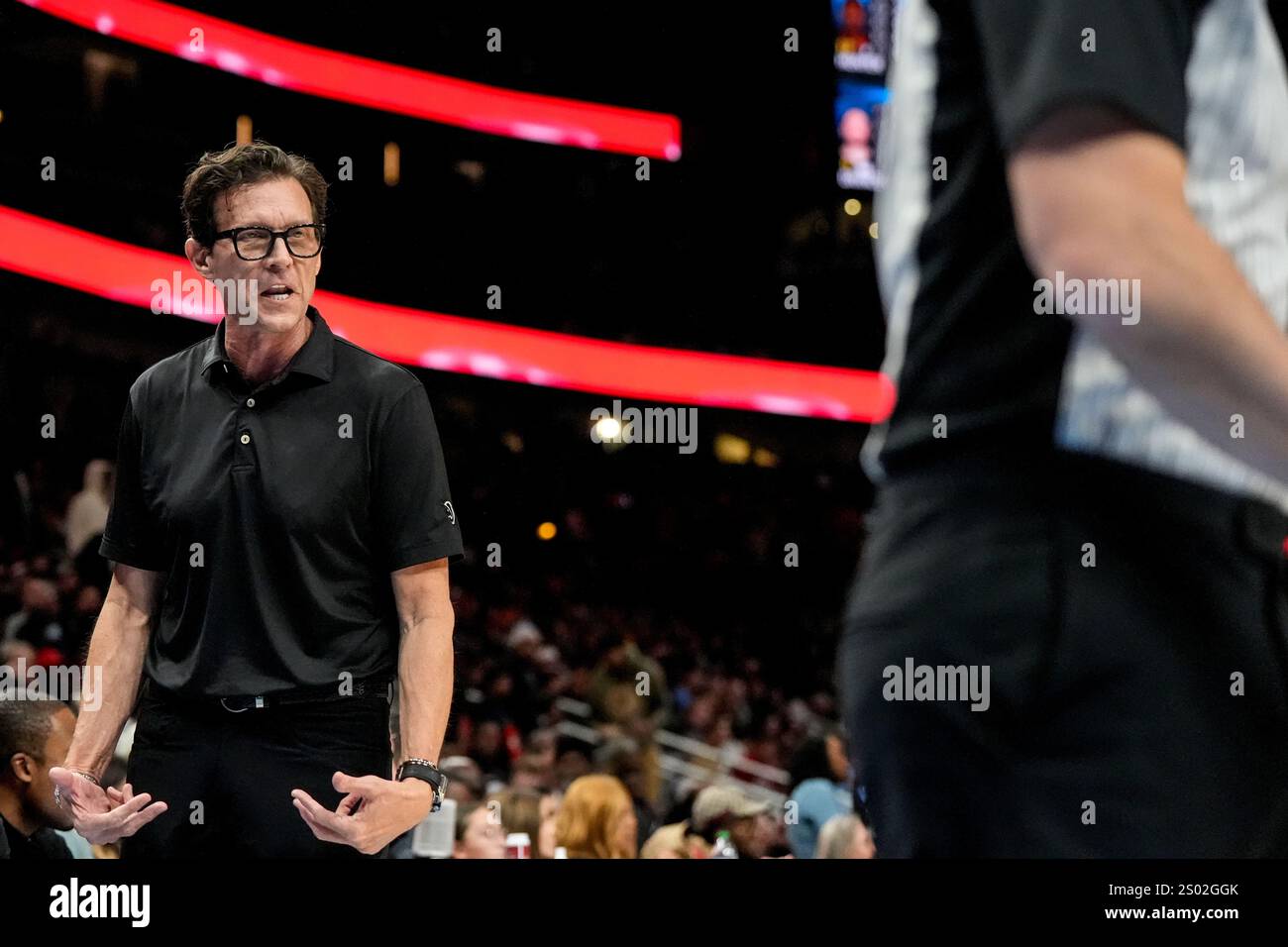 Atlanta Hawks head coach Quin Snyder speaks with an official during the ...