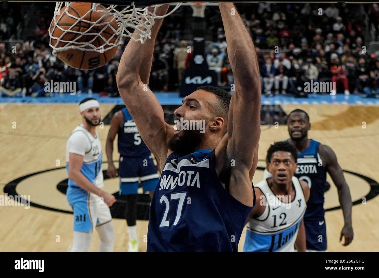 Minnesota Timberwolves center Rudy Gobert (27) dunks against the Atlanta Hawks during the first ...