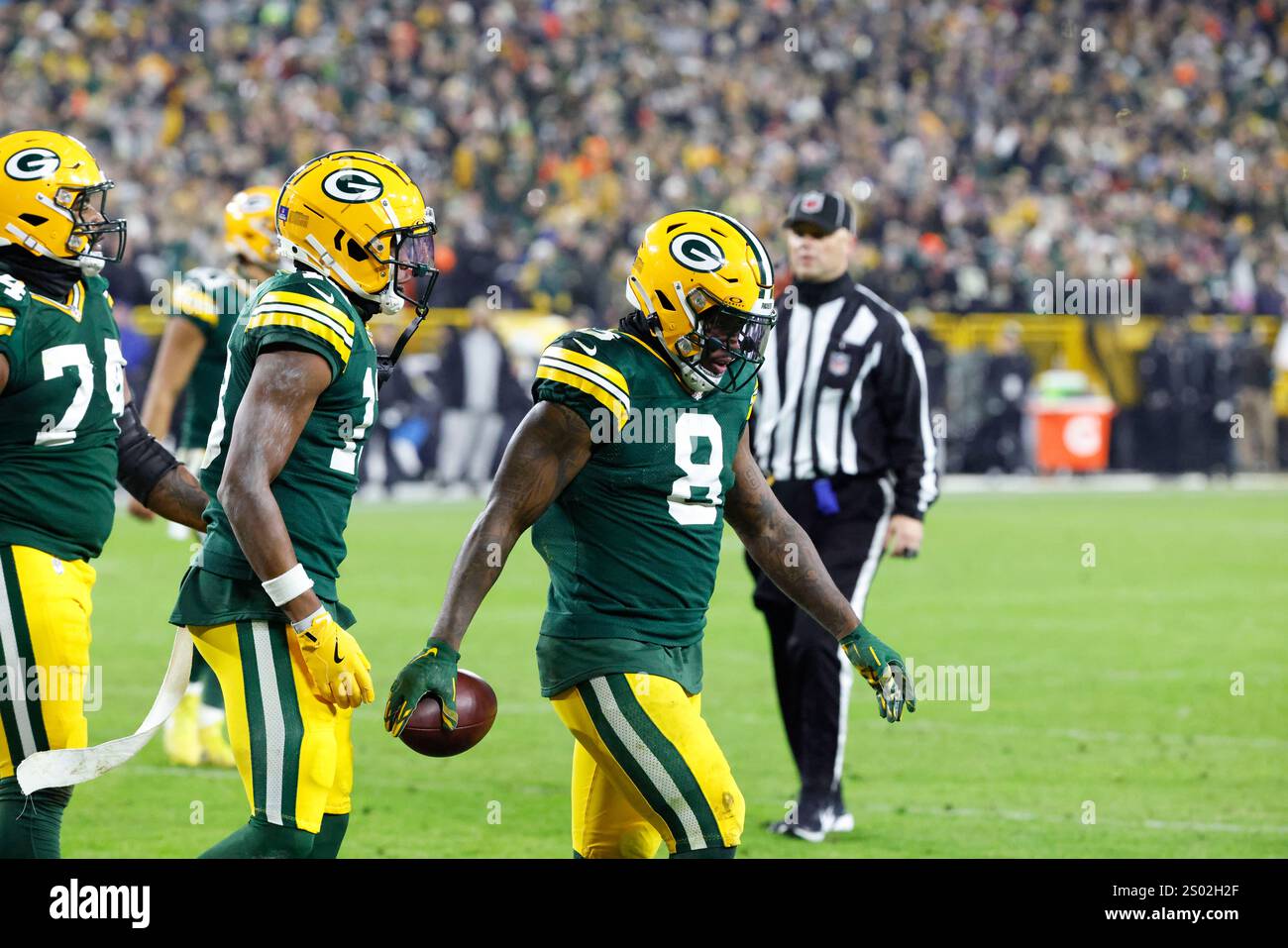 Green Bay Packers running back Josh Jacobs (8) walks off the field ...