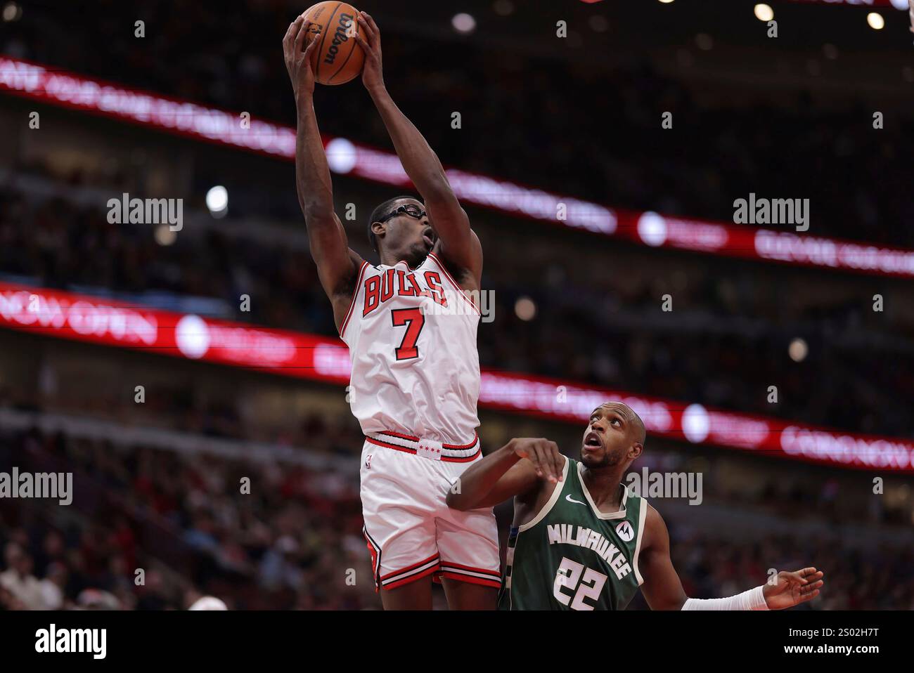Chicago Bulls forward Jalen Smith (7) grabs a rebound over Milwaukee ...