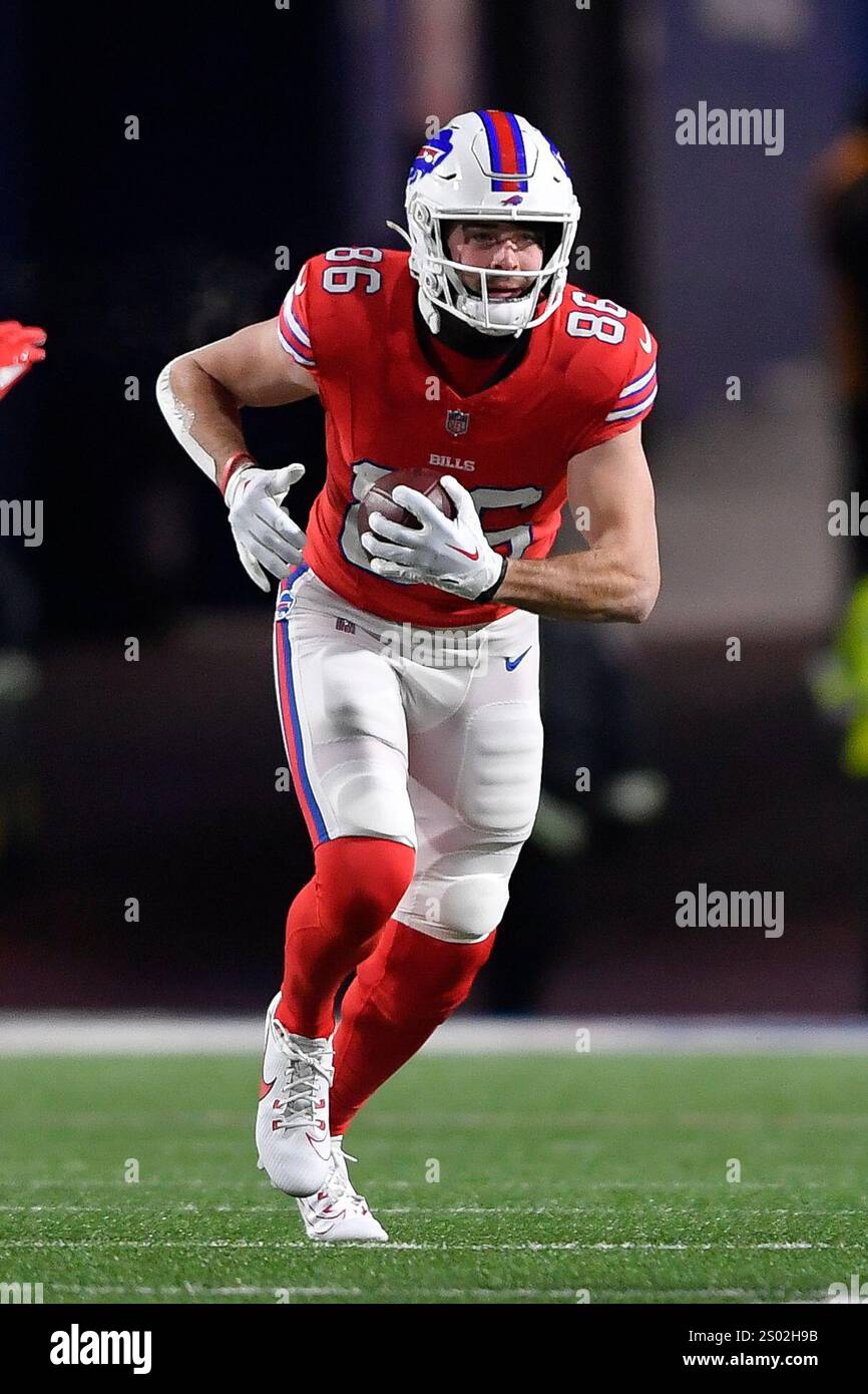 Buffalo Bills tight end Dalton Kincaid (86) runs with the ball during ...