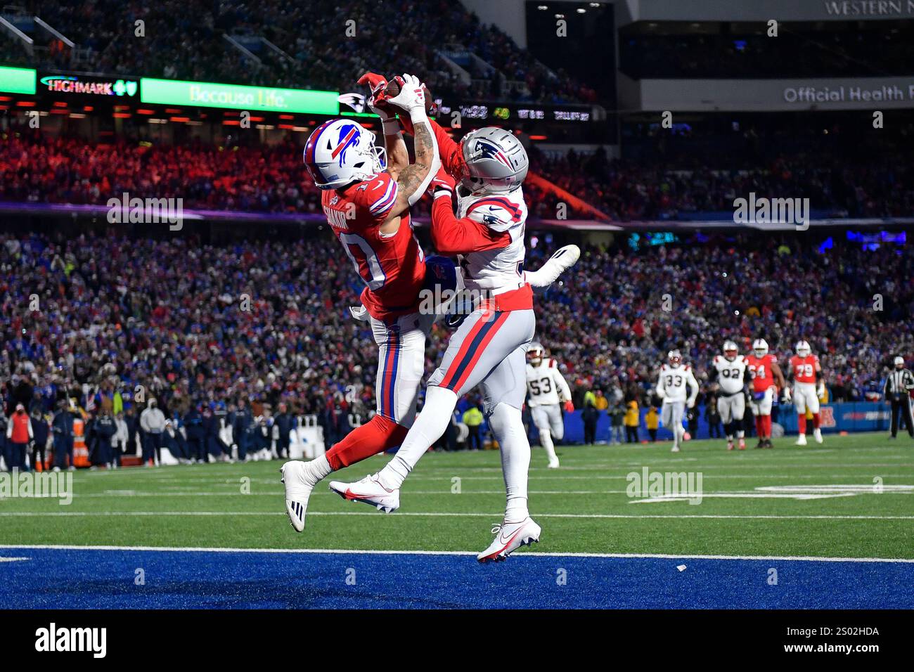New England Patriots cornerback Jonathan Jones, right, breaks up a pass ...