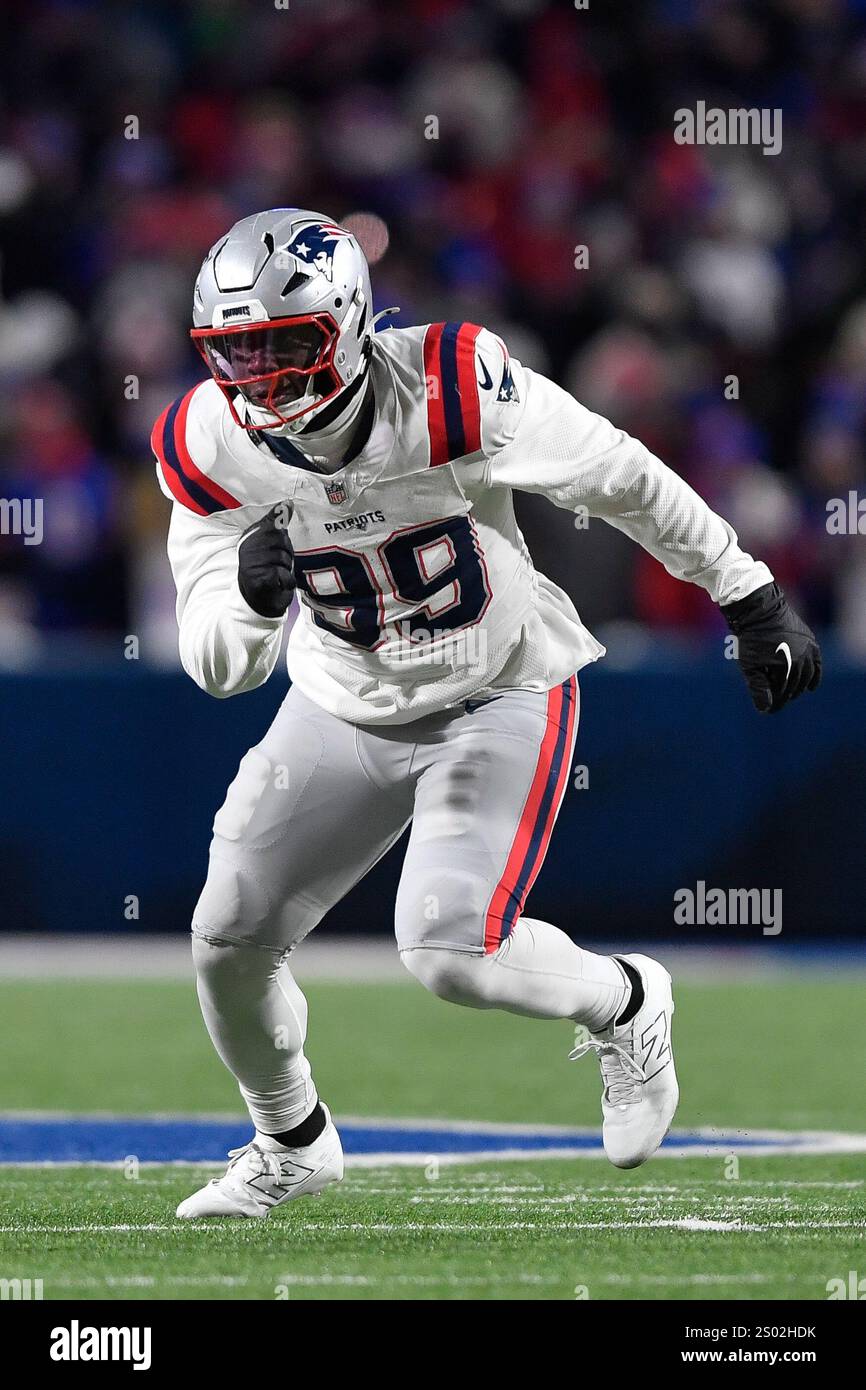 New England Patriots defensive end Keion White (99) runs on the field ...