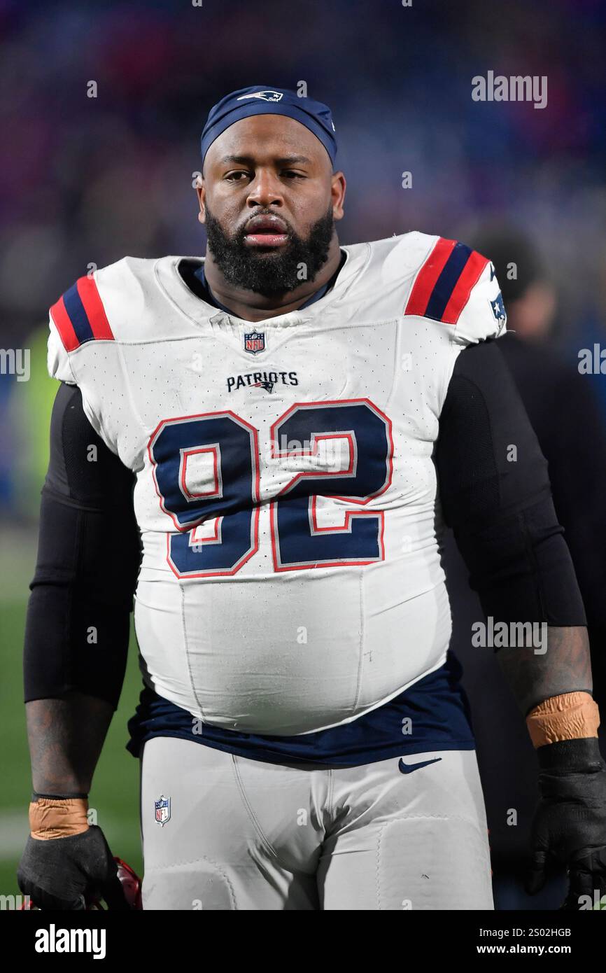 New England Patriots defensive tackle Davon Godchaux (92) walks off the ...