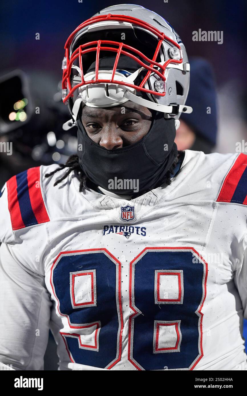 New England Patriots defensive tackle Jeremiah Pharms Jr. (98) walks ...