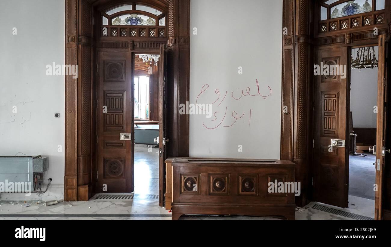 Hama, Syria. 12th Dec, 2024. Graffiti on the wall in Bashar al-Assad's ...