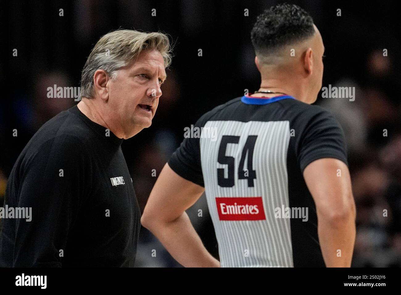 Minnesota Timberwolves head coach Chris Finch speaks with referee Ray ...