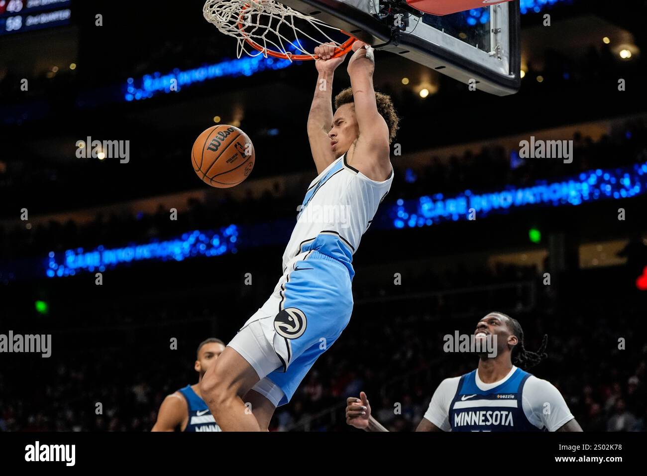 Atlanta Hawks guard Dyson Daniels (5) dunks the ball against Minnesota ...