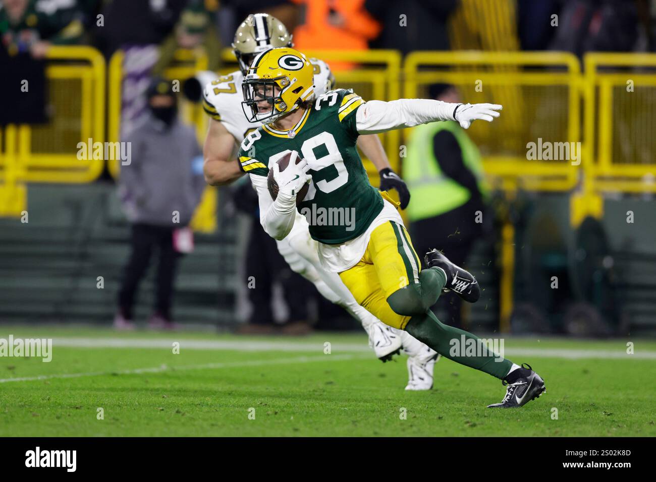 Green Bay Packers safety Zayne Anderson (39) returns an interception ...