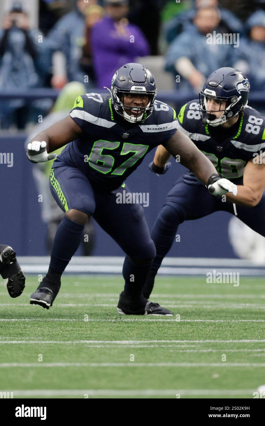 Seattle Seahawks offensive tackle Charles Cross (67) blocks against the ...