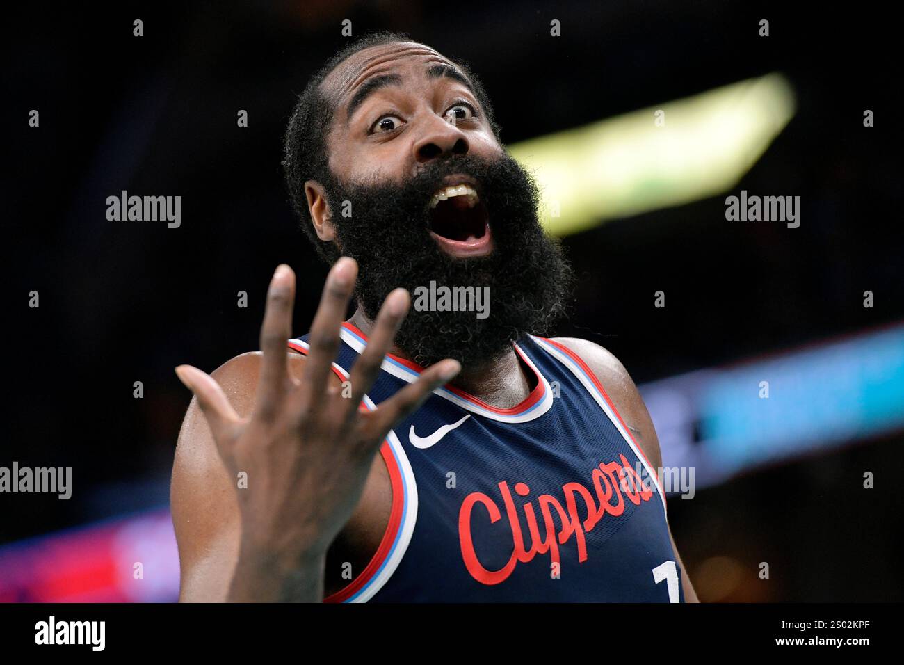 Los Angeles Clippers guard James Harden reacts in the second half of an ...
