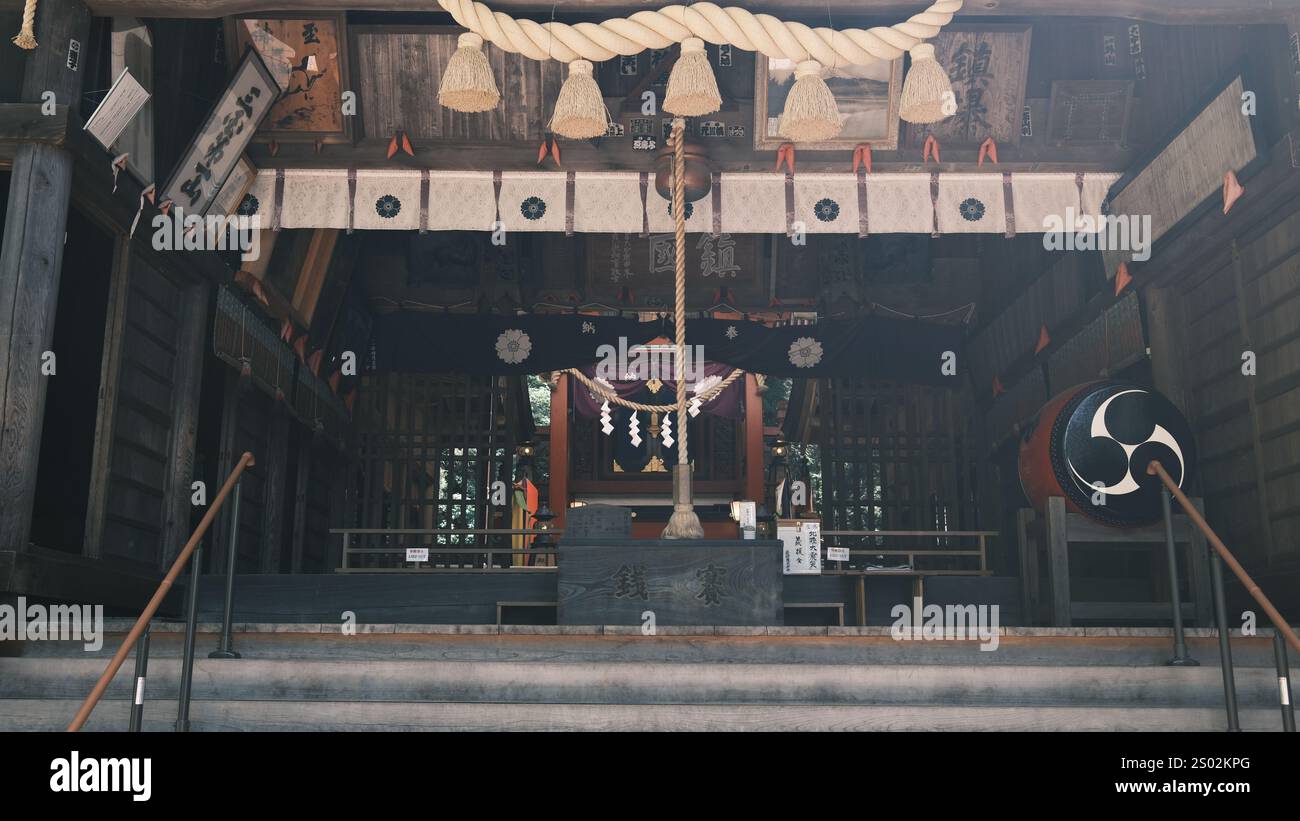 FujiKawaguchiko, Japan- May 17 2024: Japanese shrine inside the forest ...