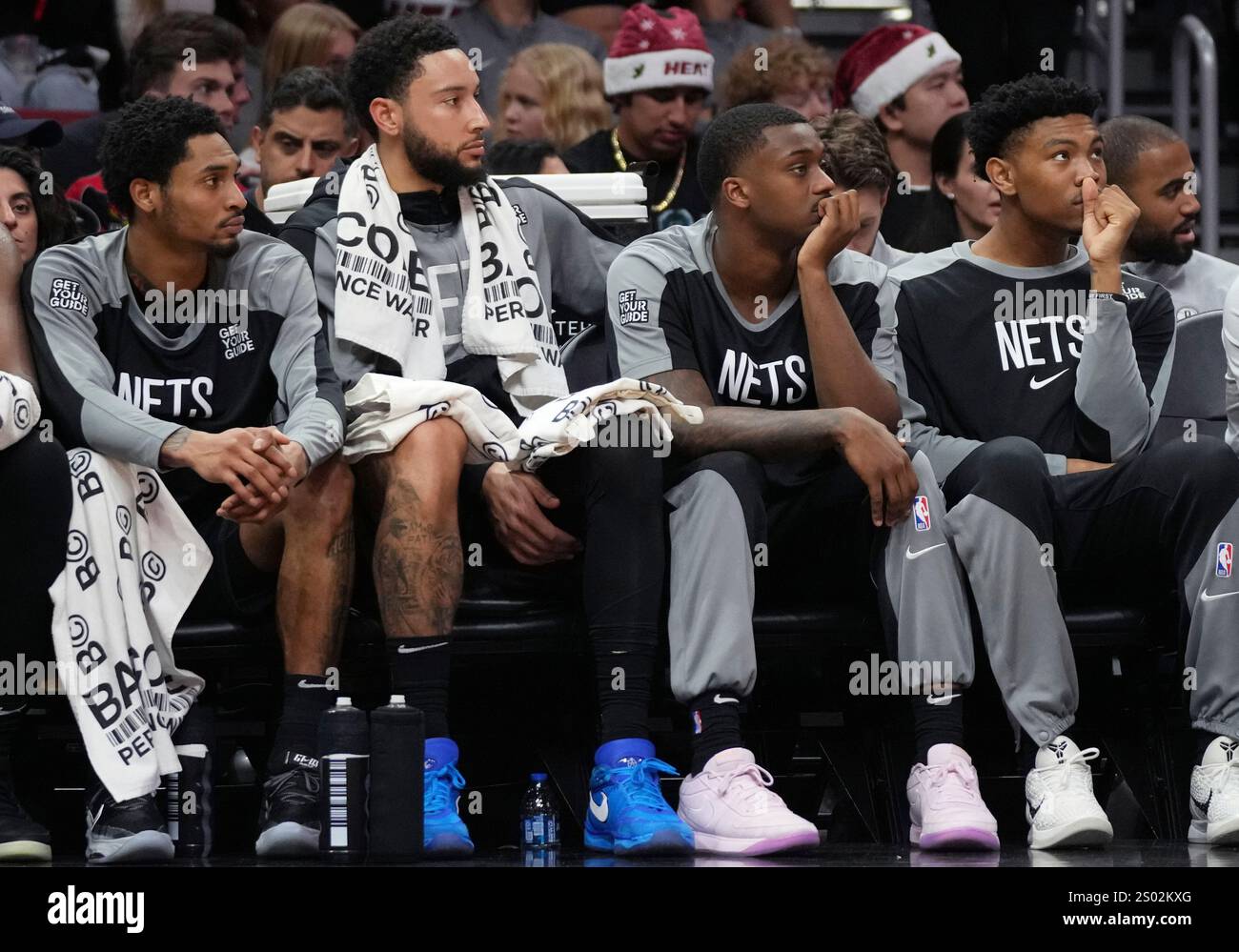 Brooklyn Nets guard Ben Simmons, second from left, watches from the ...