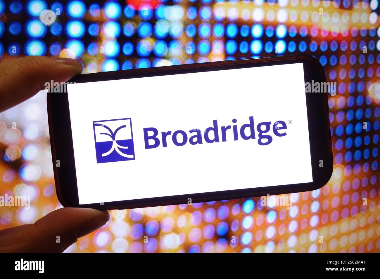 In this photo illustration, the Broadridge Financial Solutions company ...